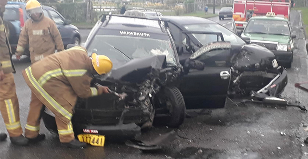 3 people rushed to hospital after a head-on-collision between two taxis